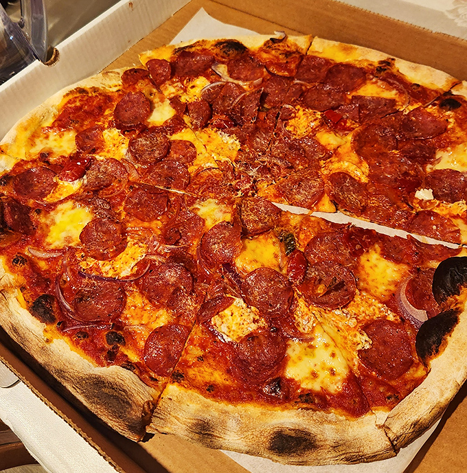 This pepperoni pizza doesn't just have toppings &ndash; it has personality. Each cup-shaped pepperoni holds a tiny pool of delicious possibility.