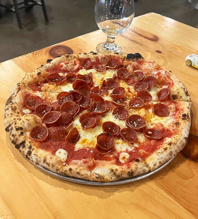 Pizza perfection in its most classic form. Those pepperoni cups crisp at the edges are little pools of flavor that would make even the most jaded New Yorker nod in approval.