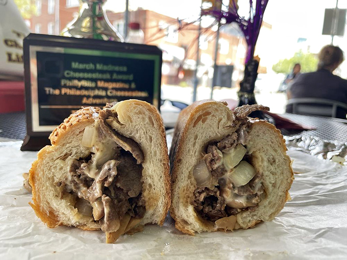 A proper Philly cheesesteak with the meat-to-bread ratio that would make Benjamin Franklin proud of his city's contribution to sandwich science.