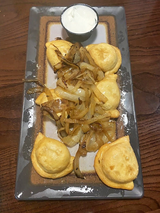 Pierogies lounging in caramelized onions like they're at a day spa. These little dough pockets are Pennsylvania's answer to Italy's ravioli&mdash;and they're winning the debate.