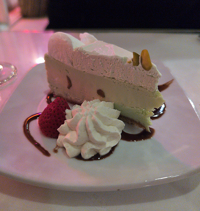 Pistachio cheesecake that makes you wonder why all desserts don't come in this shade of elegant.