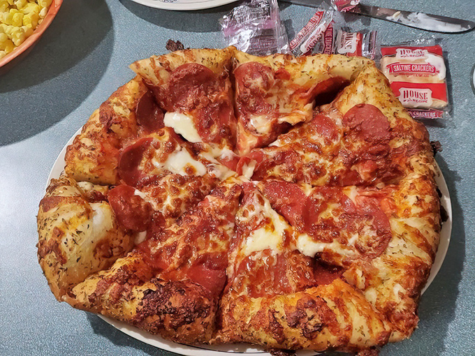Pizza that reminds you why circular food is superior&mdash;each pepperoni-studded slice a perfect triangle of happiness that needs no Instagram filter.