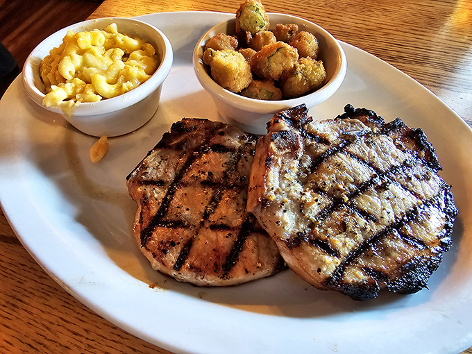 These grilled pork chops with perfect grill marks tell you everything you need to know about the kitchen's attention to detail.