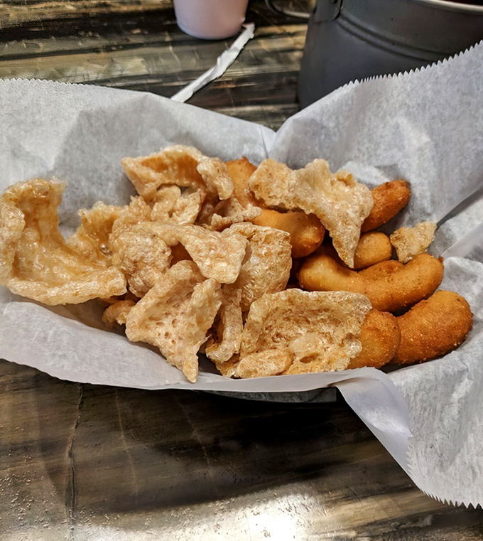 Hush puppies and pork rinds: the dynamic duo of Southern sides. One bite and you'll wonder why you ever bothered with plain old bread.