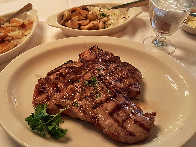 This porterhouse doesn't need fancy garnishes or Instagram filters. Just a perfectly charred exterior, tender interior, and those mushrooms playing the perfect supporting role.