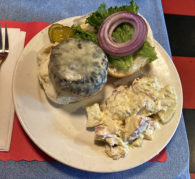 That melted cheese blanket says, "I've got you covered," while the potato salad whispers, "Save room for me too."