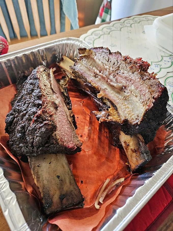 The prime rib's perfect pink interior surrounded by that smoke-kissed bark is basically meat architecture at its finest.