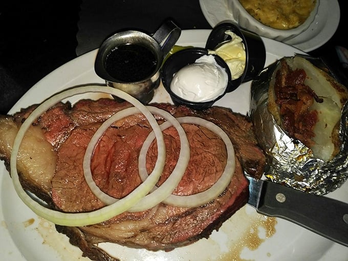 Prime rib that's been kissed by smoke and adorned with onion rings&mdash;proof that sometimes the simple pleasures are the most profound.