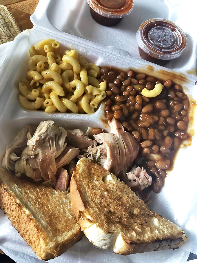 When your chicken, mac and cheese, and baked beans all share the same smoky conversation, you know you're experiencing barbecue harmony at its finest.
