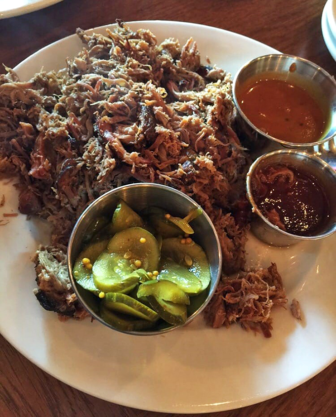 Pulled pork piled high with pickles and sauce &ndash; the kind of plate that makes vegetarians question their life choices.