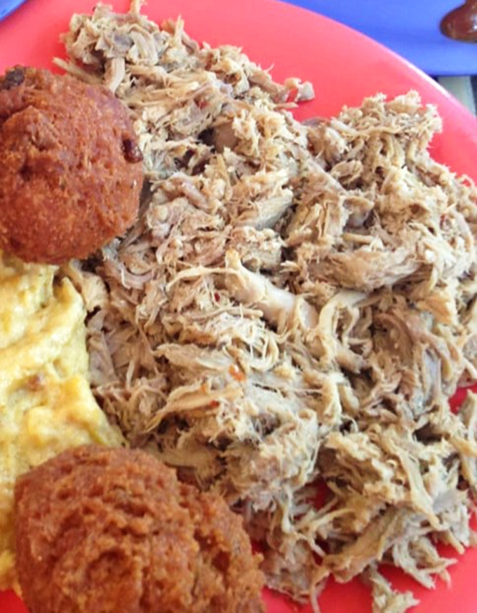 This pulled pork plate demonstrates why low and slow cooking remains the gold standard of barbecue.