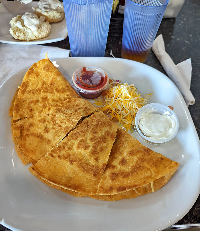 Golden quesadillas stuffed with enough cheese and chicken to make your taste buds file for overtime pay.
