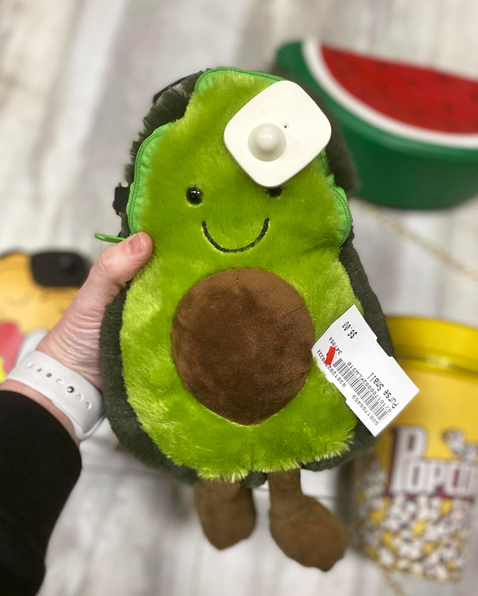 An avocado plushie with security tag intact&mdash;proof that even secondhand stores aren't immune to millennial food obsessions.
