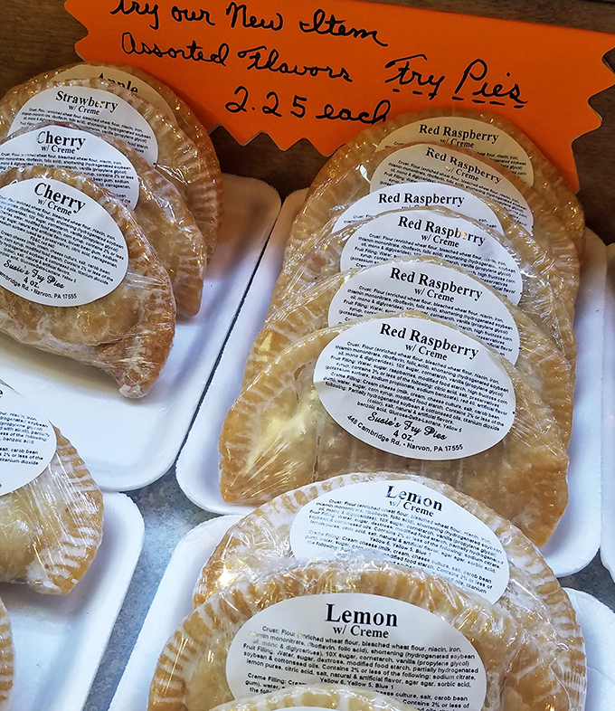 Fruit pies lined up like colorful soldiers ready for duty. The cherry and red raspberry aren't just desserts; they're Lancaster County's edible ambassadors.