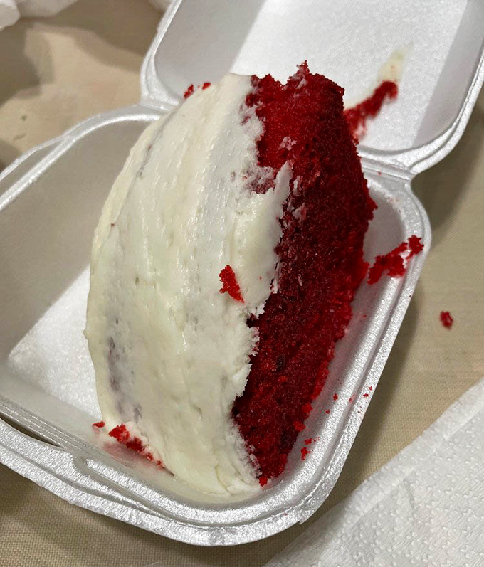 Red velvet cake that's dressed for success &ndash; vibrant crimson cake embraced by cream cheese frosting that's tangy, sweet, and utterly irresistible.
