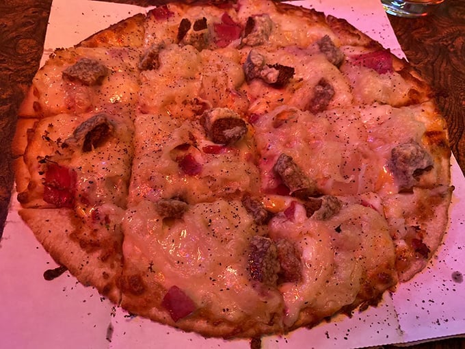 The Reuben Pizza proves that culinary mad science sometimes yields delicious results. Thousand Island dressing has never found a better home.