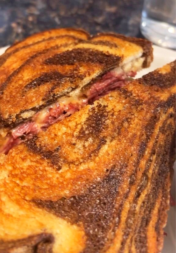The Reuben sandwich—where corned beef, sauerkraut, and Swiss cheese perform a perfectly choreographed dance on grilled rye. A Milwaukee must-have.