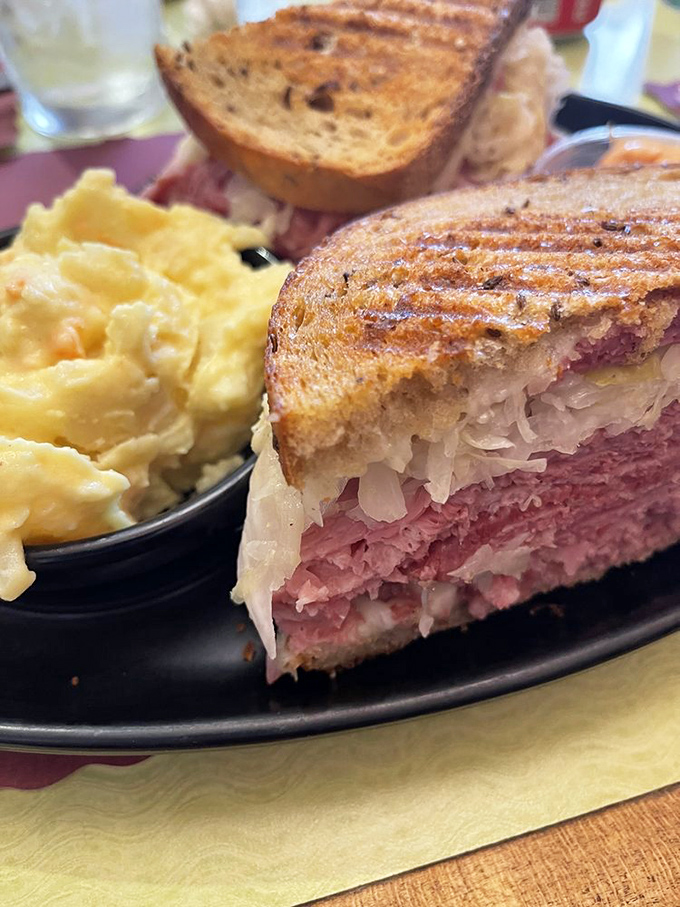 The Reuben sandwich here doesn't just satisfy hunger &ndash; it resolves existential crises. That perfect grilled rye deserves its own fan club. 