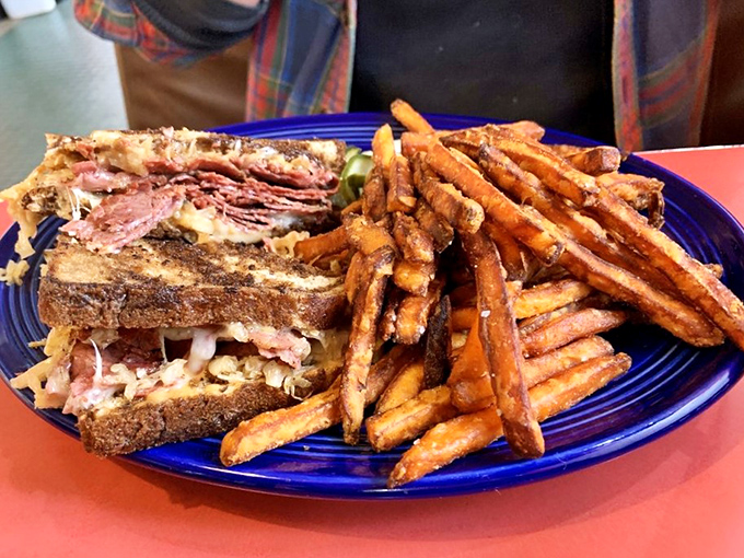 A sandwich that could make a New York deli owner nod in respect. This Reuben isn't just lunch &ndash; it's an architectural marvel of meat and bread.