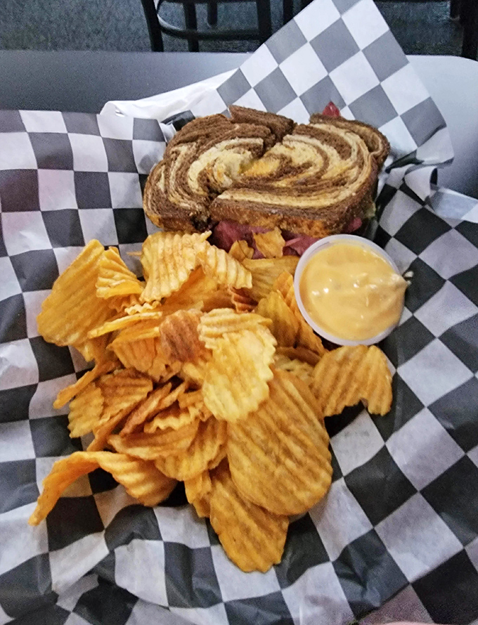 The marbled rye swirl on this Reuben is hypnotic, the chips perfectly ridged. This sandwich isn't just lunch&mdash;it's an afternoon delight.