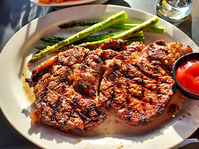 A ribeye that's been kissed by fire and served with asparagus spears standing at attention &ndash; this plate means serious business.