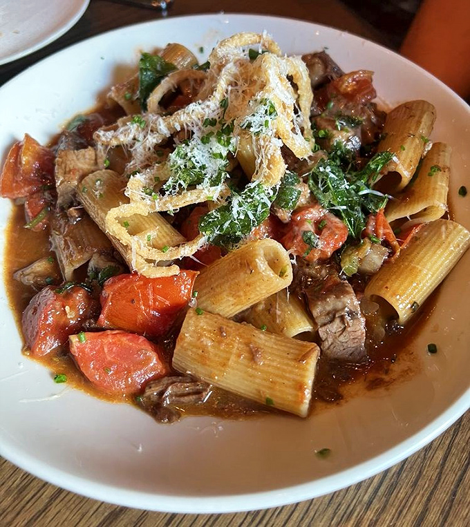 This rigatoni dish doesn't just satisfy hunger &ndash; it tells a story of slow-cooked meat, bright tomatoes, and pasta that's found its soulmate.