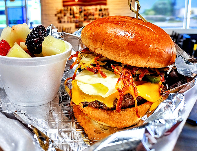 When a burger comes wrapped like a present with a side of fresh fruit, it's not just lunch&mdash;it's an edible love letter to American classics.