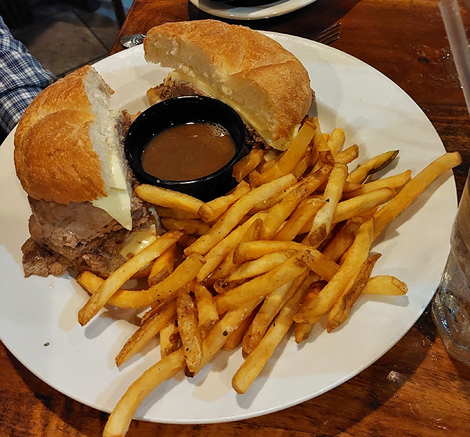 A sandwich that understands the assignment: tender roast beef, crusty bread, and fries that could easily steal the spotlight if given half a chance.