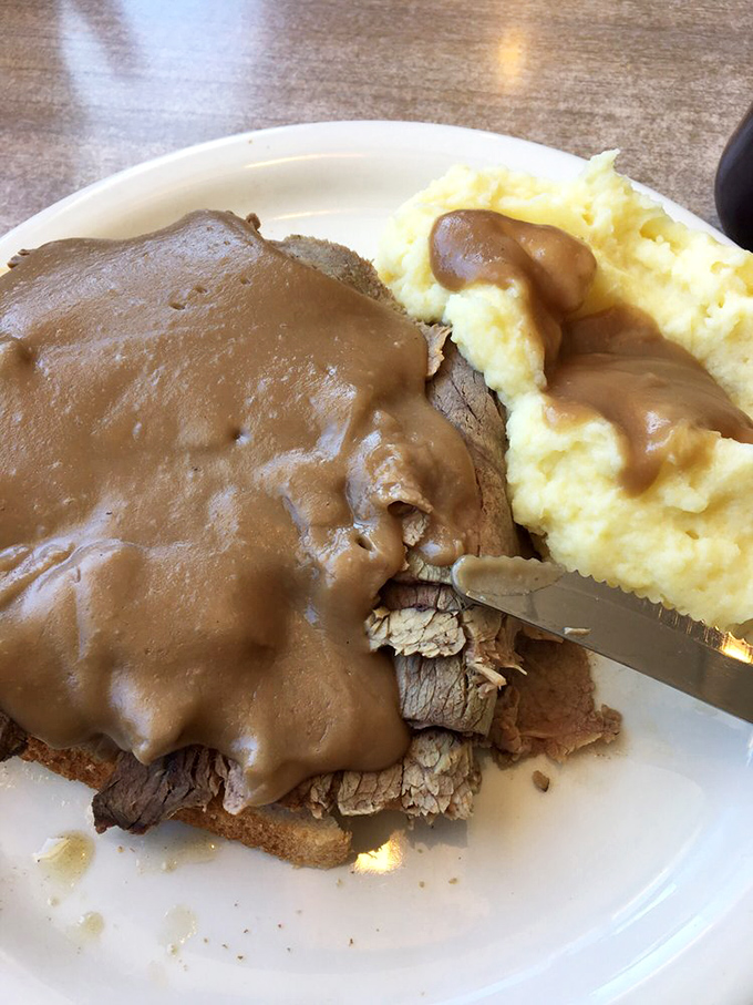 The roast beef sandwich&mdash;tender, juicy meat smothered in gravy that could make cardboard taste delicious, alongside mashed potatoes that clearly never came from a box.