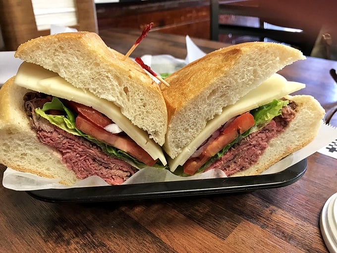 This isn't just a sandwich; it's a carefully constructed monument to beef, cheese, and vegetables that demands respect with every bite.