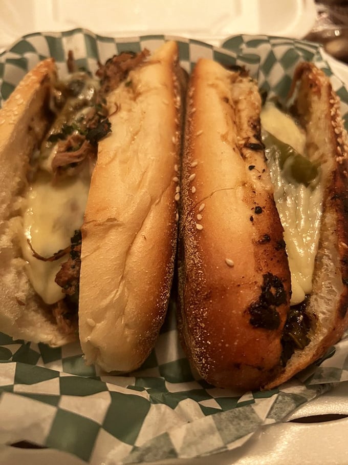 Cheese oozing from perfectly toasted bread, embracing seasoned meat like long-lost lovers. This sandwich doesn't just satisfy hunger&mdash;it creates happiness.