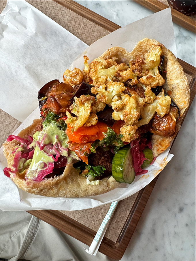 Roasted cauliflower transforms from humble vegetable to star attraction in this pita pocket. Even dedicated carnivores might experience vegetable envy.