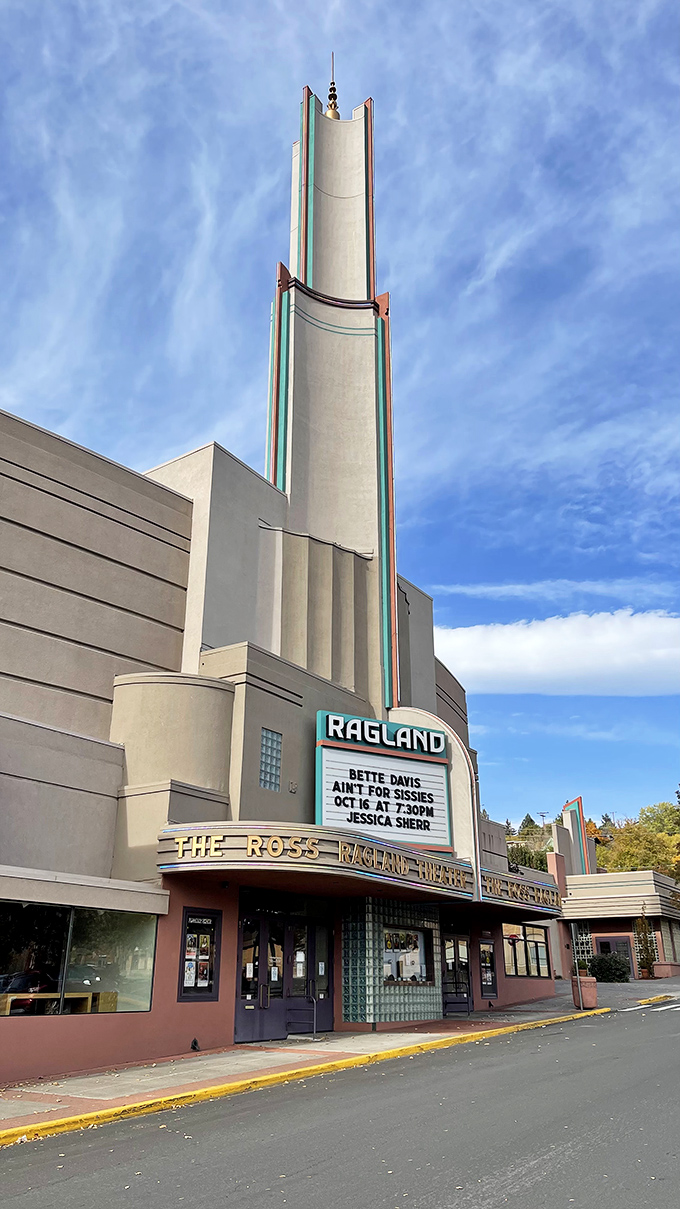 City Hall stands dignified among flowering trees, proving that government buildings don't have to look like they were designed by accountants during a particularly dull meeting. 
