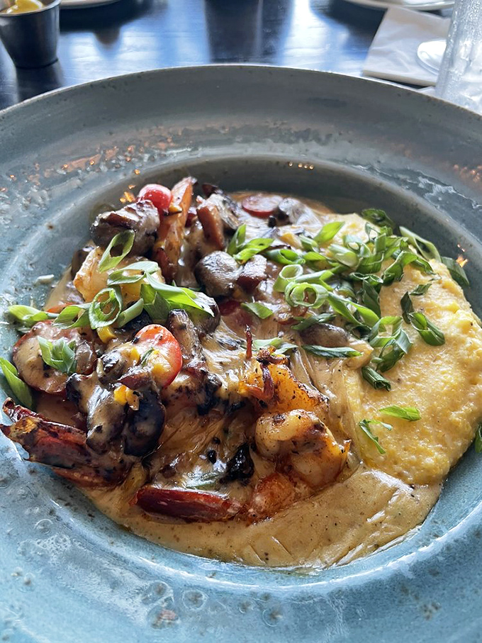 Shrimp and grits elevated to an art form, proving comfort food can wear a tuxedo.