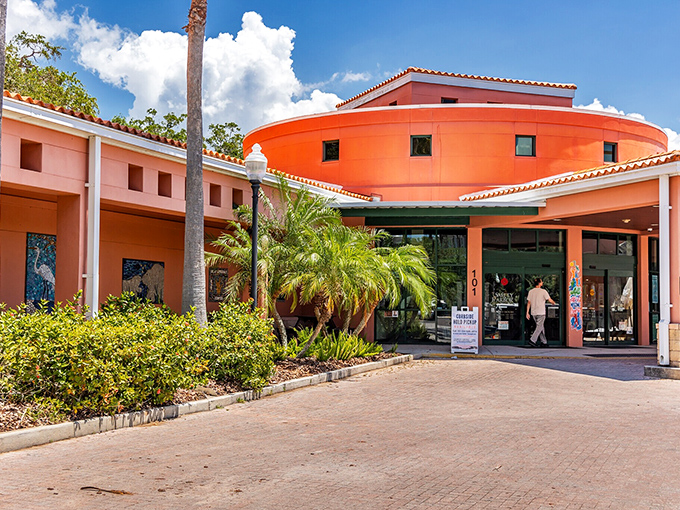 The vibrant orange library building stands as a testament to Safety Harbor's commitment to both architectural character and community gathering spaces.