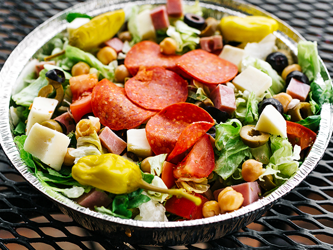 The antipasto salad &ndash; where vegetables pretend to be healthy while hanging out with pepperoni and cheese in a delicious identity crisis.