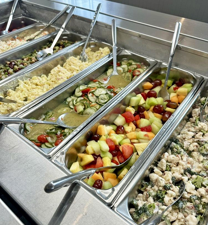 A salad bar that proves vegetables can peacefully coexist with a fried chicken dinner.