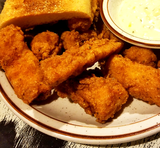 Golden-brown chicken tenders that could make a food snob weep with joy. Comfort food elevated beyond its humble origins.