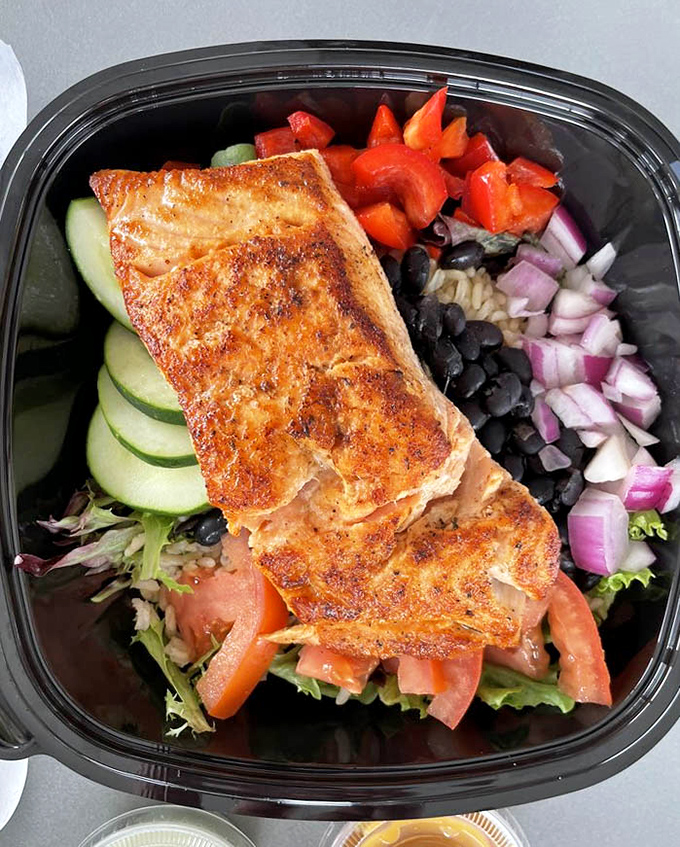 Who knew healthy could look this good? Perfectly seared salmon atop a garden of vegetables&mdash;like a Florida sunset captured in food form.