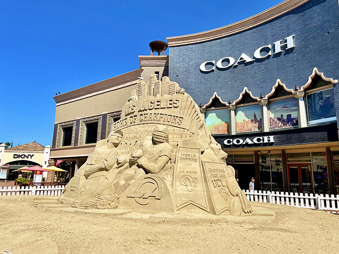 This isn't just sand&mdash;it's a masterpiece outside Coach celebrating Los Angeles culture, proving even the decorations at Citadel have artistic ambitions.