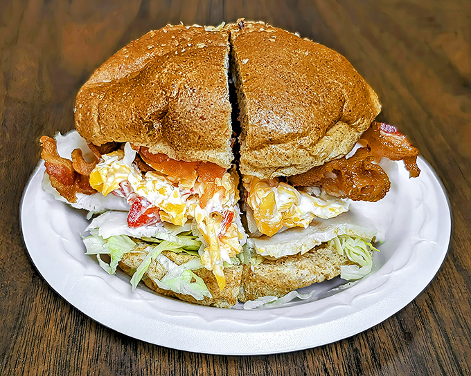 The club sandwich&mdash;architecture you can eat. Layers of flavor stacked so high they need that toothpick structural support.