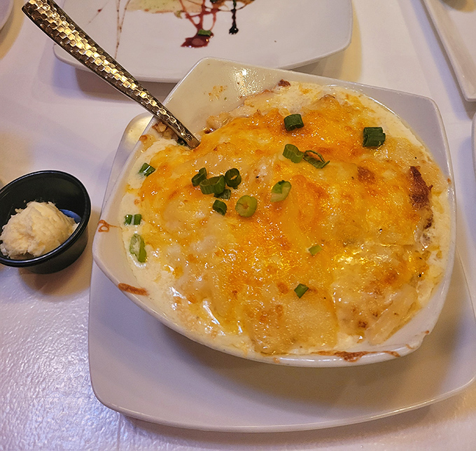 Not your cafeteria's scalloped potatoes&mdash;this bubbling masterpiece of cheese and potato is what comfort food dreams about at night.