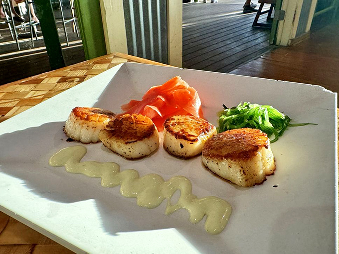 Seared scallops that would make any Food Network chef proud, plated with artistic flair and ready for their Instagram moment.