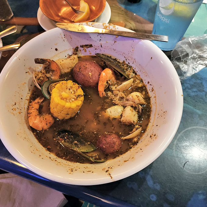 A seafood boil that's essentially a treasure hunt in broth form. Finding each perfectly seasoned morsel feels like winning a delicious aquatic lottery.