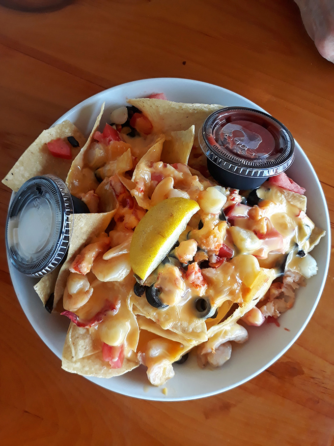 Seafood nachos that turn a happy hour classic into a coastal celebration. Every chip is a treasure hunt of oceanic delights.