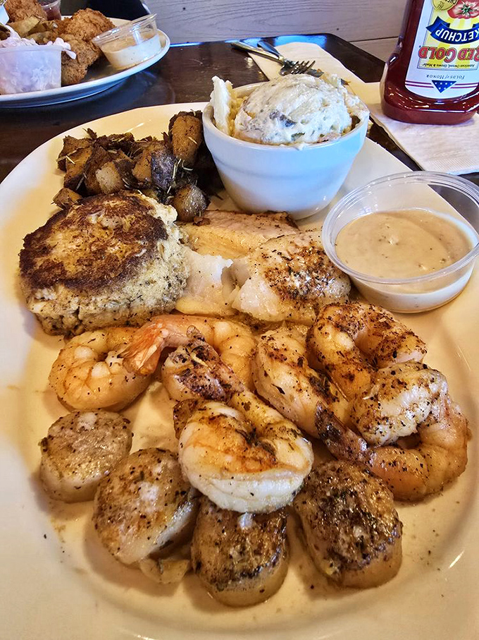 A seafood platter that answers the eternal question: "Why choose one when you can have it all?" Those perfectly seared scallops are the unsung heroes here.
