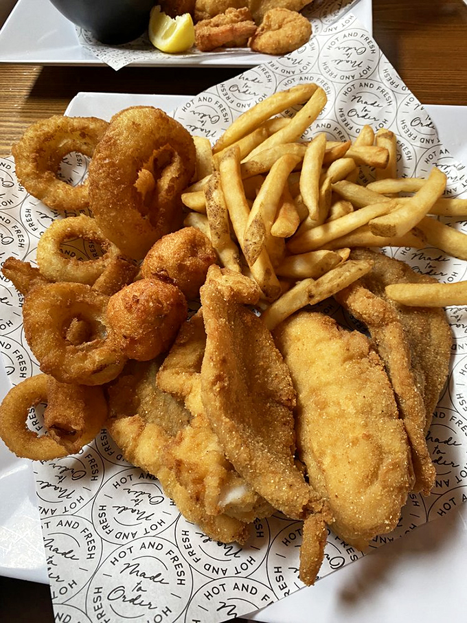 Fried seafood perfection on a plate. When the fish was swimming yesterday and fried today, you know you're living right.