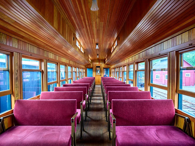 Polished wood ceilings and plush burgundy seats create a time capsule interior that Instagram filters desperately try to replicate but never quite capture.