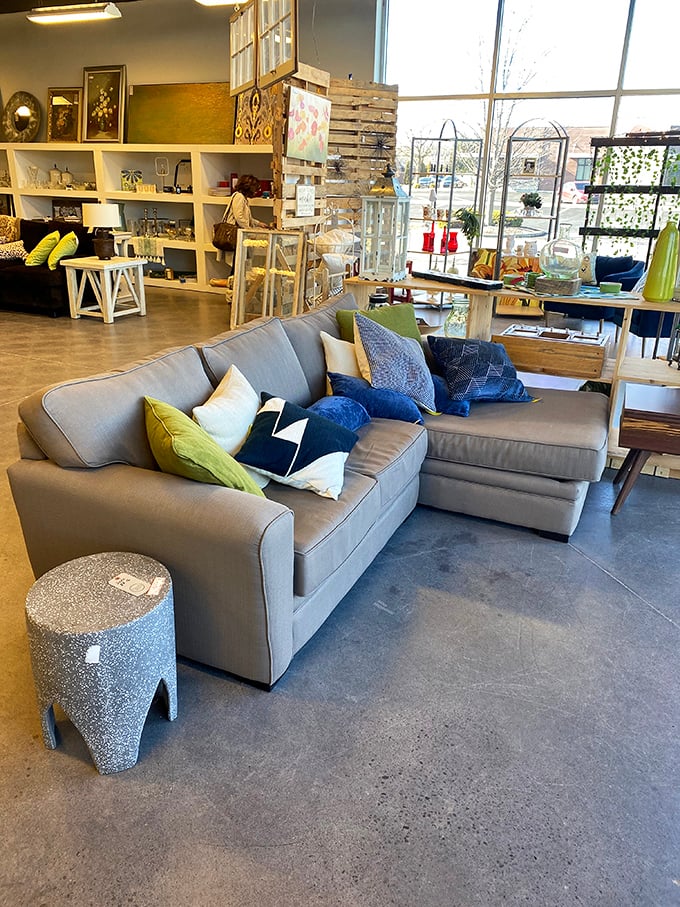 This sectional sofa, adorned with perfectly mismatched pillows, silently begs to host your next Netflix marathon.