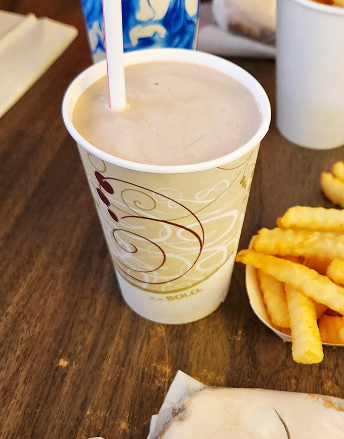 A proper shake served in an unpretentious paper cup. Cold, creamy perfection that makes you wonder why anyone bothers with fancy glassware.